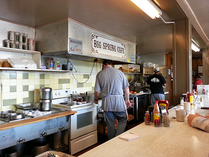 The open kitchen isn't theater; it's transparency. These cooks aren't performing&mdash;they're crafting the same reliable deliciousness they've made for decades.
