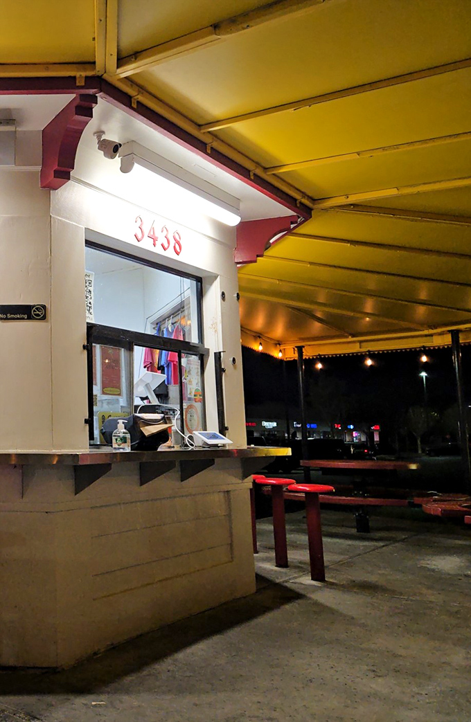 Nighttime at the order counter&mdash;where dreams and hunger meet under the gentle glow of fluorescent lighting.