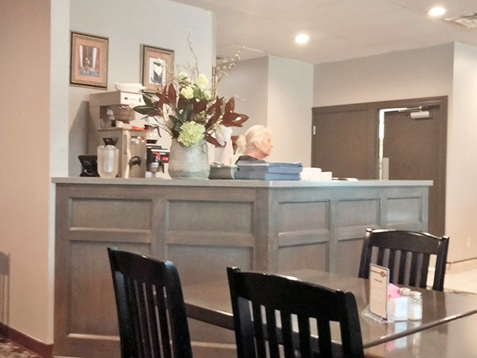 The reception area welcomes you with subtle elegance, proving you don't need big-city pretension to create a memorable dining experience.