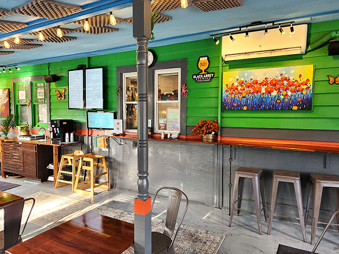Where the magic happens! Vibrant green walls, local art, and a counter that's witnessed countless "Oh my goodness" first-bite reactions.