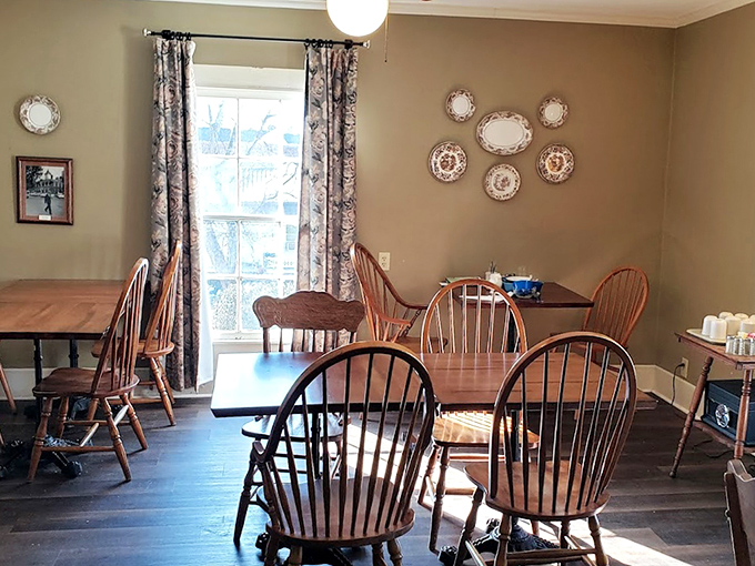 A dining room where conversations flow as easily as the sweet tea. Those Windsor chairs have heard more Tennessee tales than most history books.