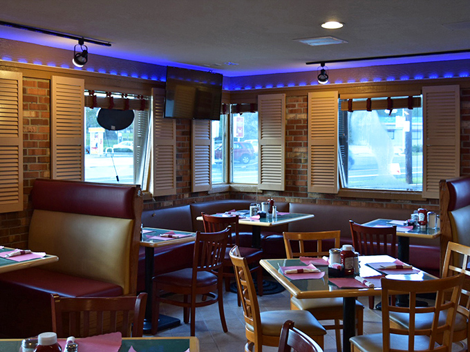 Those blue accent lights aren't just for show&mdash;they're setting the mood for serious eating in booths designed for lingering conversations.