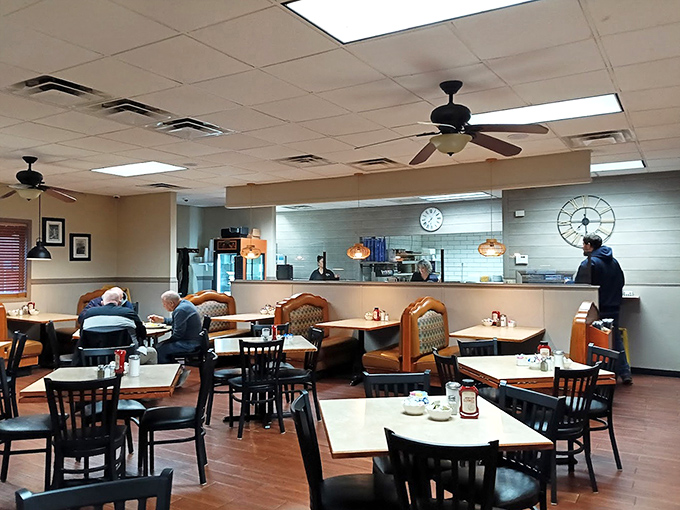 The dining room's warm wood tones and simple decor create the perfect backdrop for food that doesn't need fancy surroundings to shine.