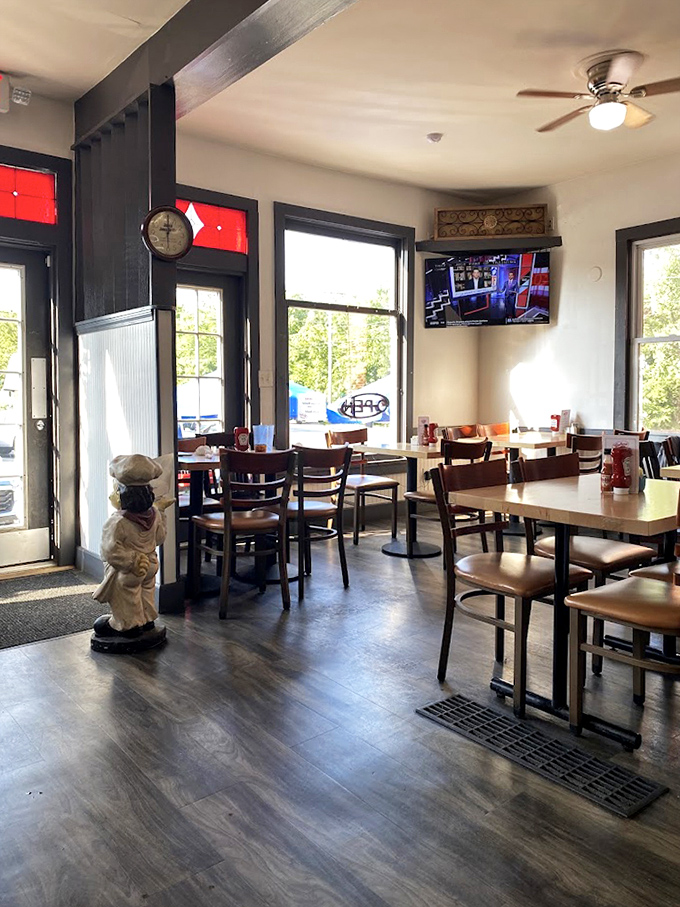 Warm wood tones, natural light, and a chef statue standing guard &ndash; dining rooms don't get more inviting than this.