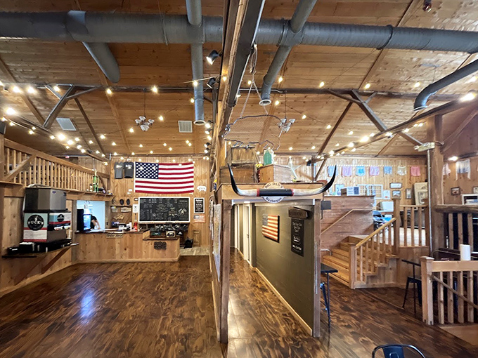 The interior feels like the coolest barn conversion you've ever seen, where every wooden surface tells a story of smoky celebrations past.