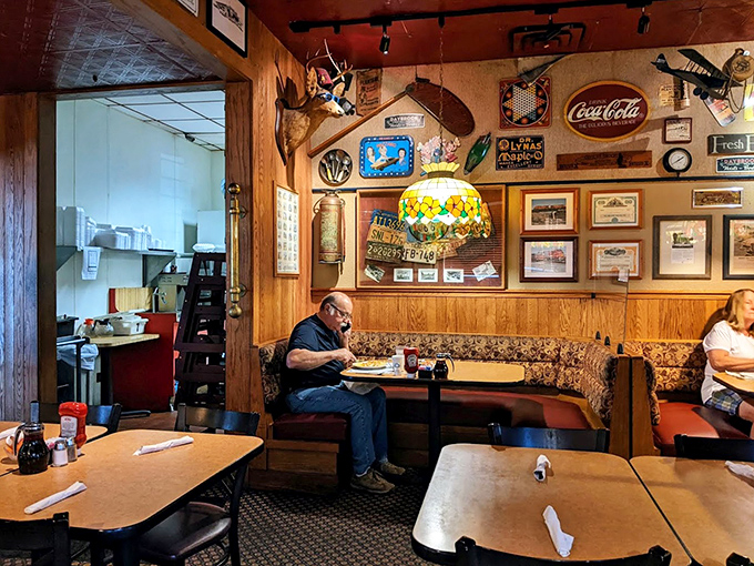 The corner booth &ndash; that coveted real estate where regulars hold court and newcomers aspire to sit, under the watchful gaze of vintage memorabilia.