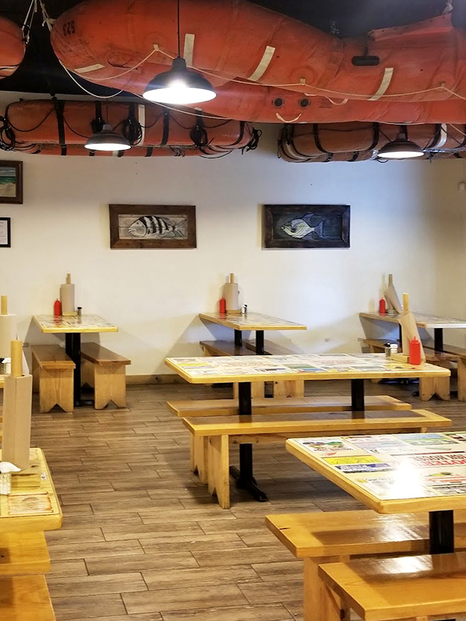 Another dining room view where fishing memorabilia isn't decoration&mdash;it's a visual appetizer preparing you for the feast to come.