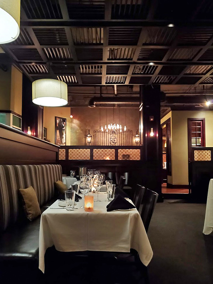 Booth seating that whispers "stay awhile" with lighting designed to make first dates successful and business deals inevitable.