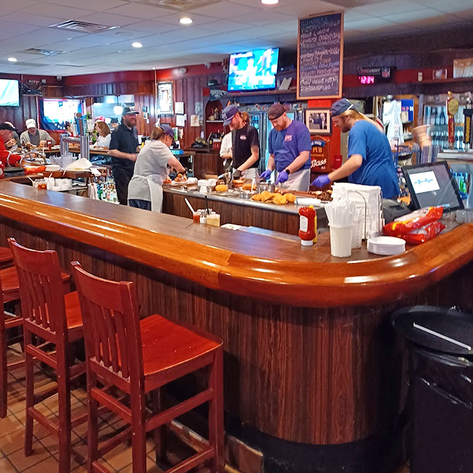 Where magic happens&mdash;the bustling bar area where drinks are poured, stories are shared, and strangers become friends over plates of Pennsylvania comfort.