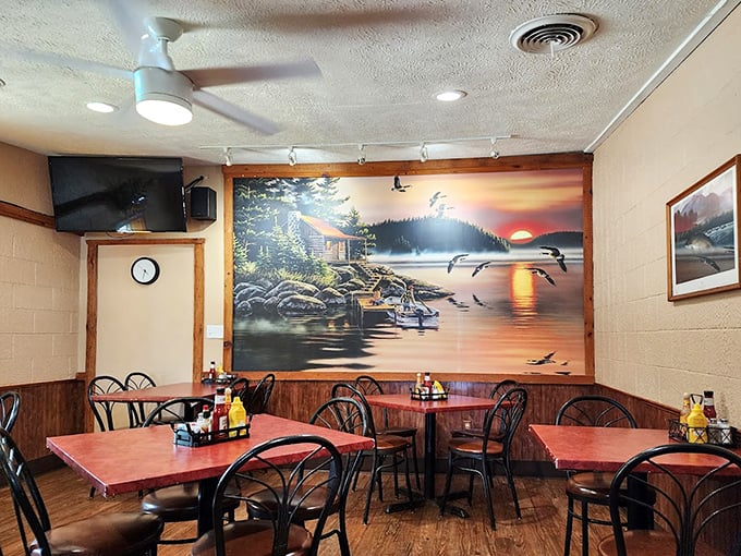 The dining room features a stunning lakeside mural that makes you feel like you're eating with a million-dollar view, even on a Tuesday.