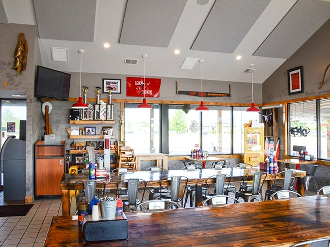 Metal chairs, wooden tables, and all the charm of a place that knows exactly what it is: a temple of smoked meat devotion.