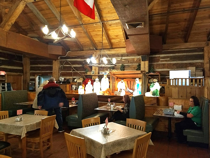 Christmas comes early in this dining room, where holiday decorations and coffee mugs create the perfect mountain morning ambiance.