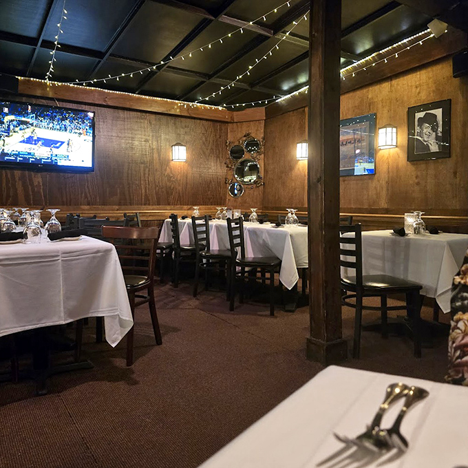 The dining room feels like it's been hosting important conversations since before cell phones existed. These tables have heard more secrets than most therapists.