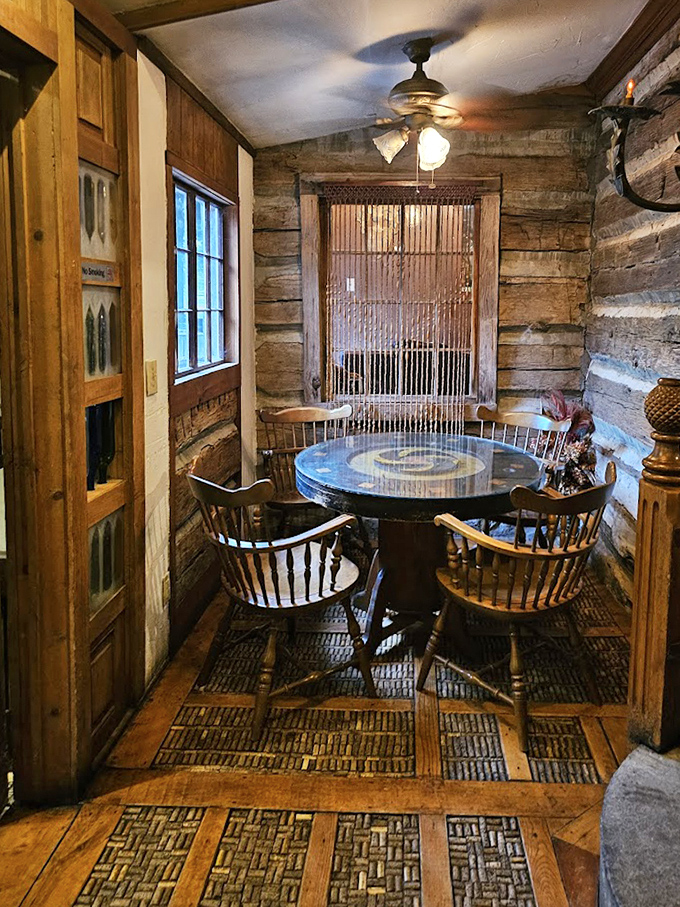 Intimate dining nooks carved from history &ndash; where Windsor chairs and exposed log walls create the perfect setting for memorable conversations.