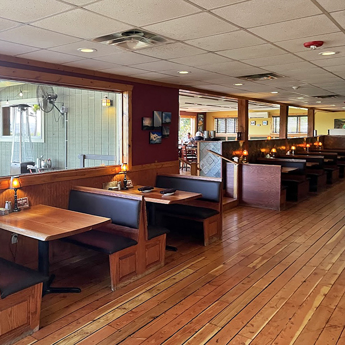 Cozy booth seating where conversations flow as smoothly as the excellent food being served here.