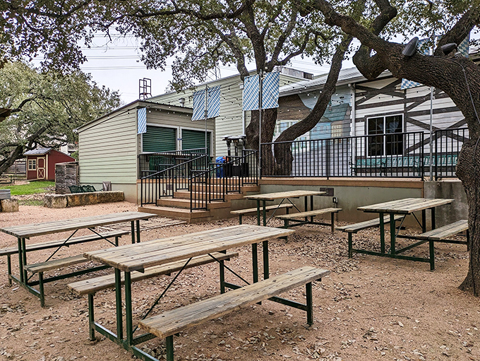 Outdoor seating under Texas oak trees offers a peaceful alternative for enjoying your pancakes in the wild.
