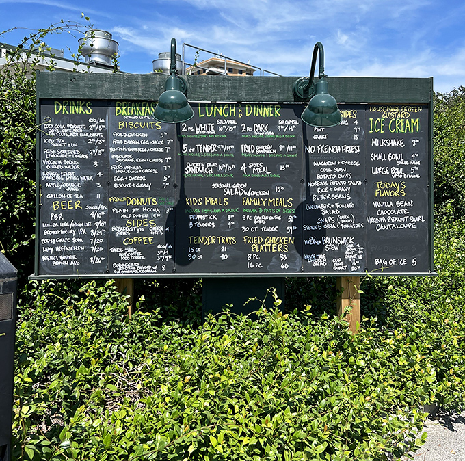 The outdoor menu board stands like the Ten Commandments of comfort food, bathed in Virginia sunshine and promising salvation for the hungry.