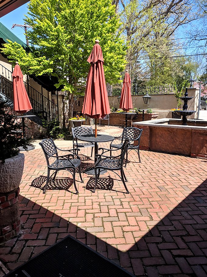 Brick patio dining under cheerful umbrellas offers the perfect setting for leisurely meals when Delaware weather decides to cooperate beautifully.