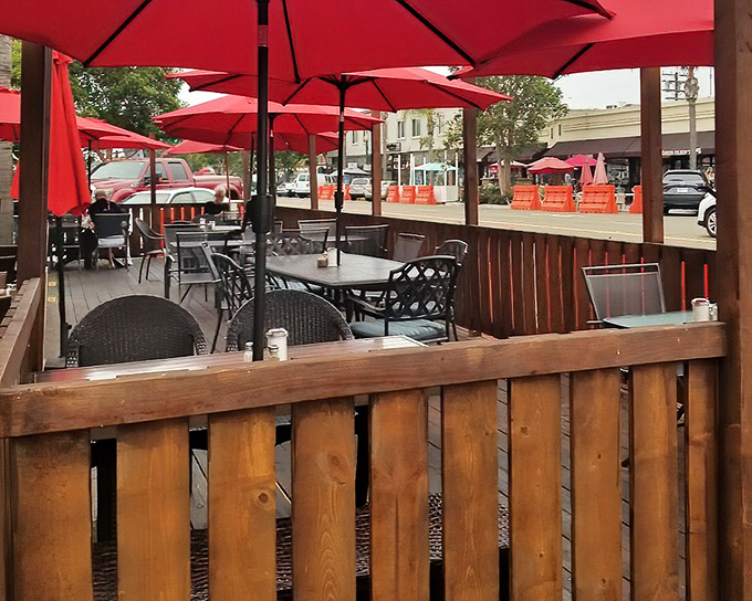 The outdoor patio with its cheerful red umbrellas offers a front-row seat to Encinitas life. California dining as it should be.