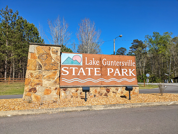 The gateway to adventure. This sign has photobombed more family vacation photos than any teenager's peace sign.