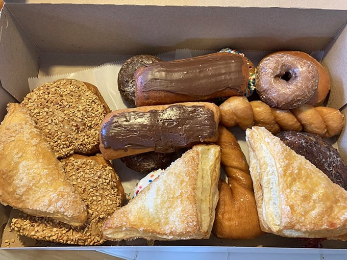 A donut box assortment that turns ordinary mornings into celebrations and makes "one of each" a perfectly reasonable order.