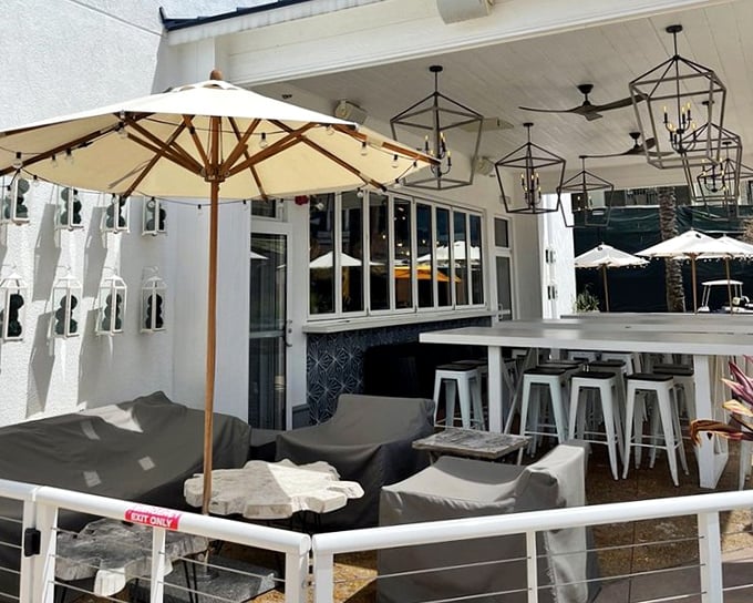 The outdoor patio&mdash;where cushioned seating and market umbrellas create the perfect setting for that "I could get used to this" Florida moment.