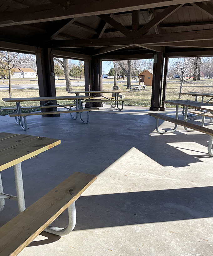 This shaded pavilion offers respite from summer sun and the perfect spot for family gatherings. Picnic tables with a view.