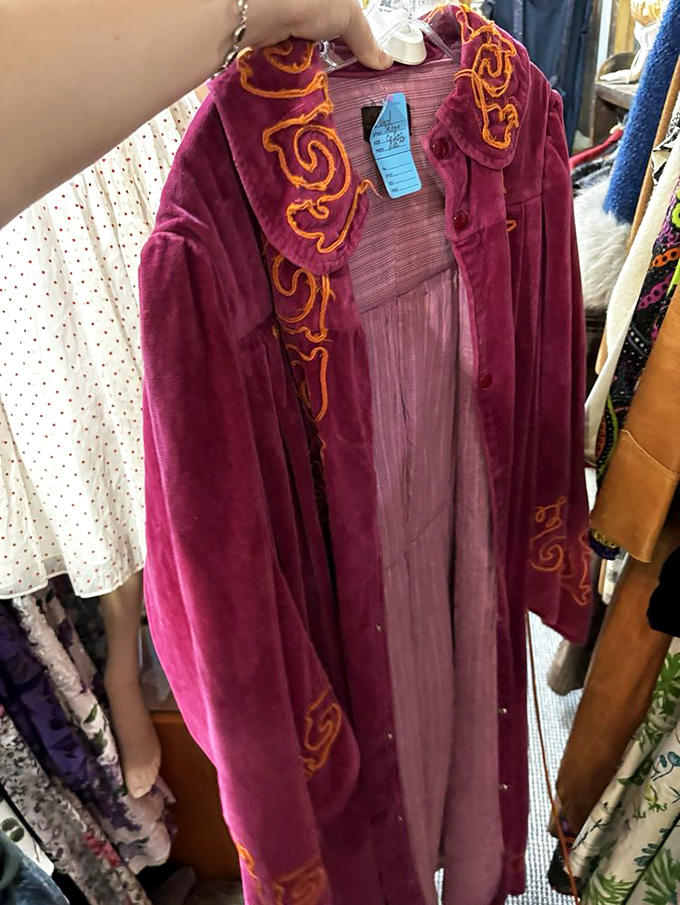 A velvet coat with embroidered swirls that whispers "I have stories you wouldn't believe."