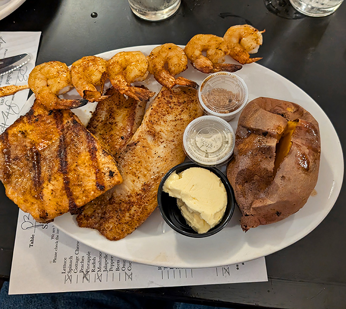 The seafood and chicken platter that answers the eternal question: "Why choose one when you can have it all?"