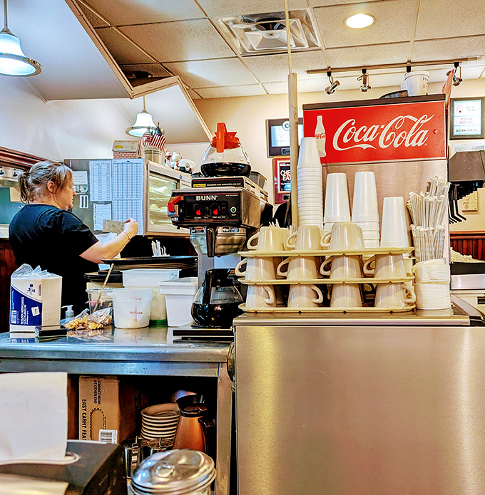 Where the magic happens. Coffee cups stacked like a caffeinated game of Jenga, ready for the next wave of chili enthusiasts.