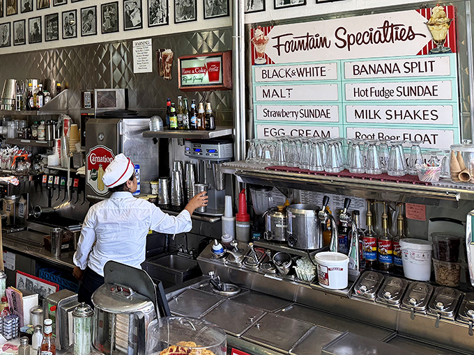 The fountain area isn't just where food is prepared&mdash;it's theater. Those menu boards aren't just lists, they're promises of joy.