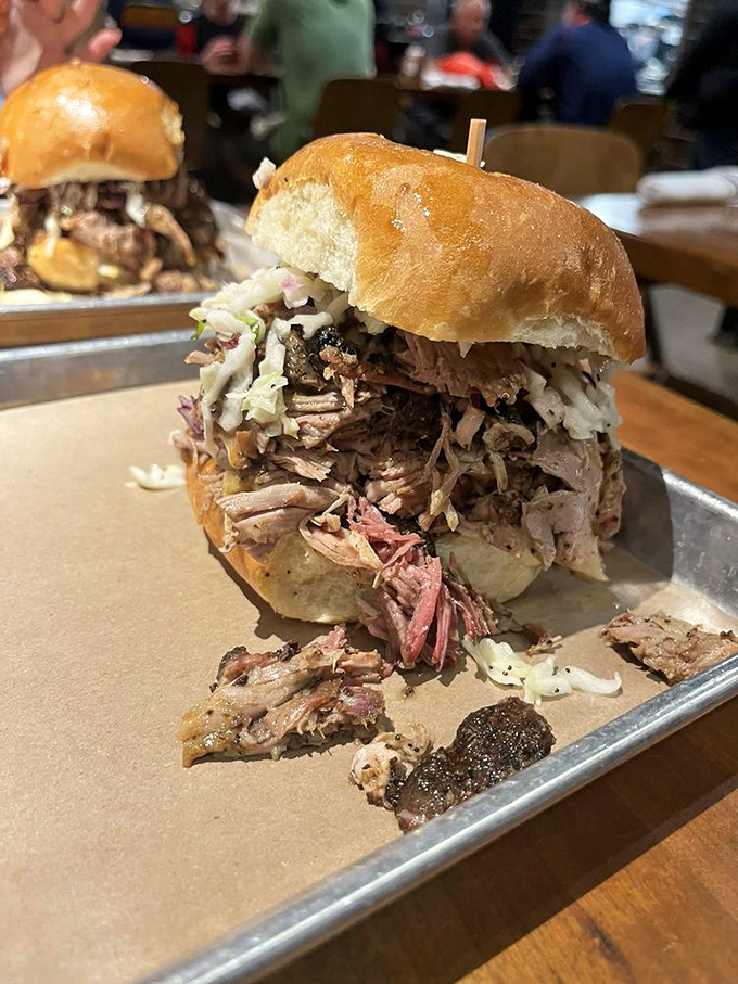 This sandwich isn't just overstuffed&mdash;it's living its best life. The pulled pork practically cascades down the sides like a meaty waterfall.