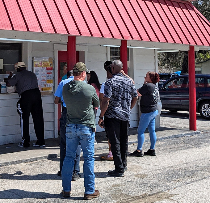 The line forms early and for good reason. These folks aren't just waiting for food—they're queuing for a religious experience.