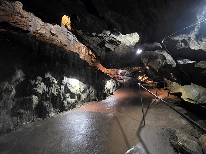 The entrance building welcomes visitors with rustic charm before they descend into the geological wonders waiting below.