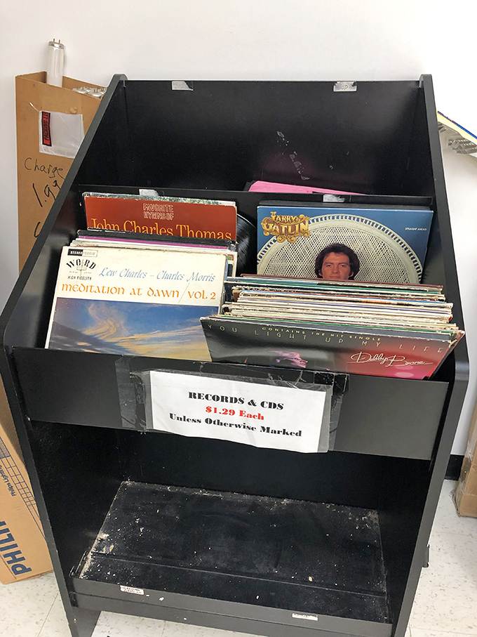 Vinyl and CDs spin tales of music collections past, ready to soundtrack someone's future.