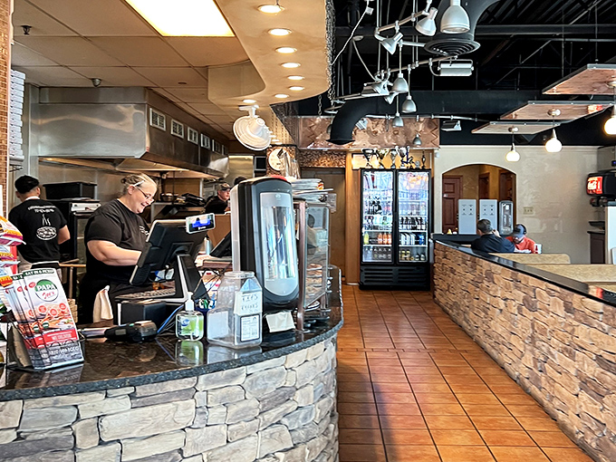 The ordering counter where dreams become reality and breadstick fantasies transform into golden, garlicky truth.