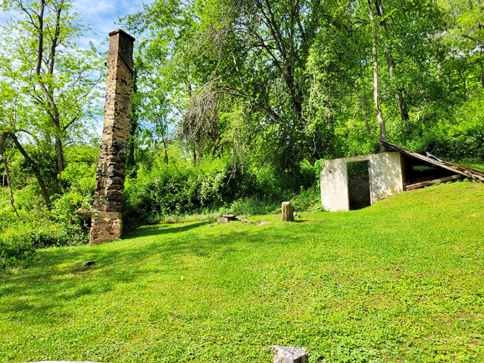 History stands tall in stone &ndash; this chimney whispers stories of settlers who chose this paradise long before GPS could find it.