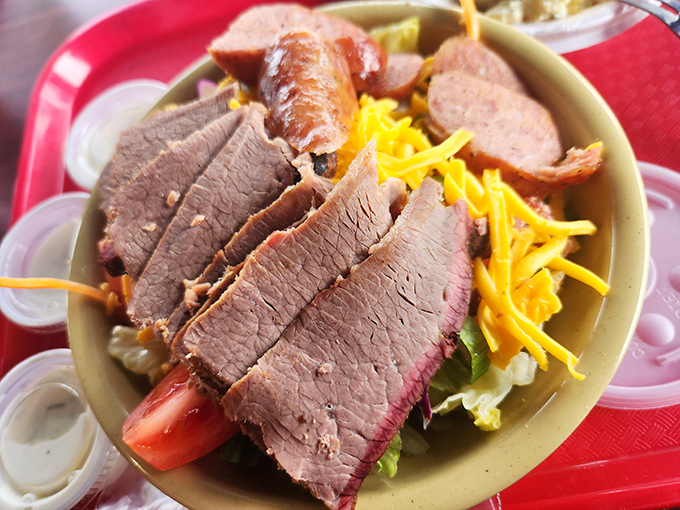 Protein perfection: sliced brisket atop fresh greens. When Texas meets California on a plate, everybody wins.