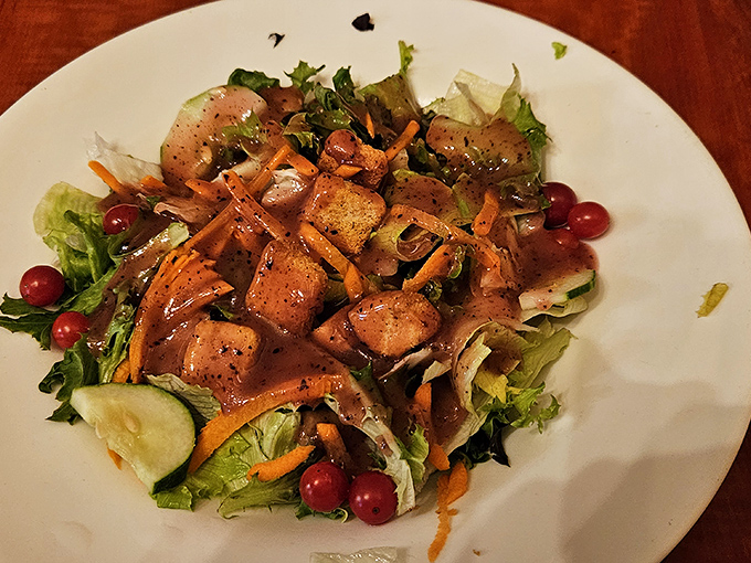 A salad that actually satisfies! Tender chunks of seasoned protein dance with fresh greens and cherry tomatoes in perfect harmony.