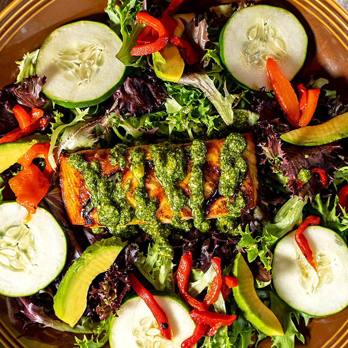Fresh greens topped with grilled protein &ndash; proof that tavern food doesn't always mean guilty pleasures.