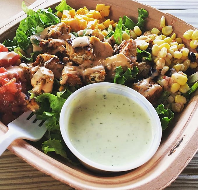 A bowl that proves salads can be exciting &ndash; grilled chicken, fresh veggies, and that creamy dressing you'll be dreaming about later.