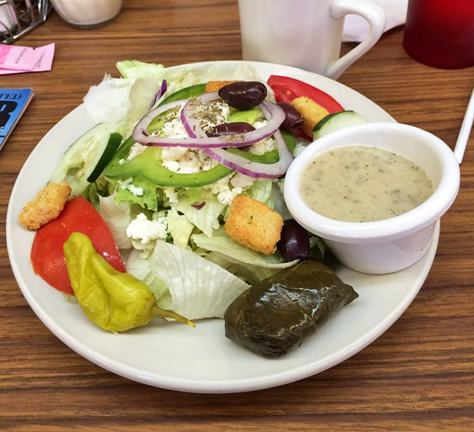 A Greek salad that offers a refreshing counterpoint to diner indulgence, proving Five Points knows there should be at least one healthy option on the table.