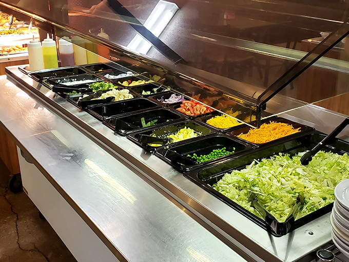 The salad bar – that magnificent first stop on your buffet journey where good intentions meet the reality of what's coming next.