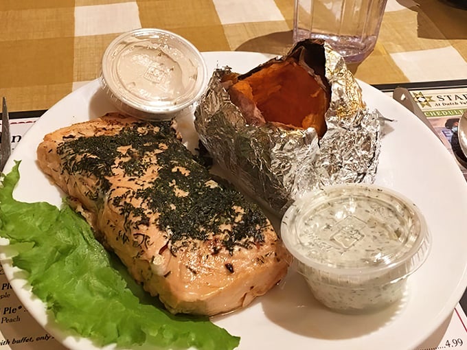Herb-crusted salmon that looks like it swam upstream just to meet that perfectly foil-wrapped baked potato&mdash;a romance for the ages.