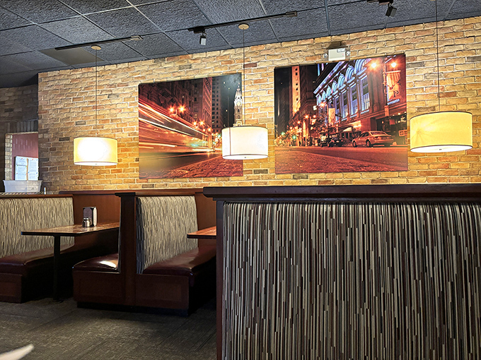 Urban chic meets Pennsylvania charm with these stylish booth seating areas. The city nightscape artwork reminds you that cosmopolitan flavors await on your plate.