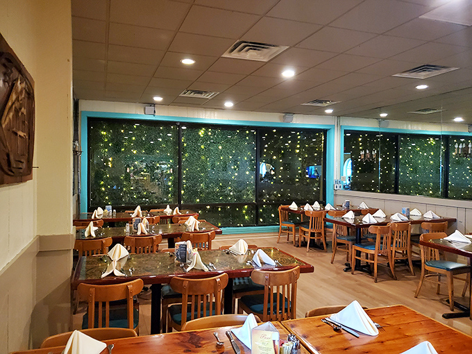 Evening dining with twinkling lights outside creates the perfect atmosphere for making important life decisions, like "Should I get thirds?"