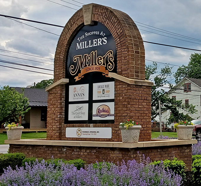 The sign announces Miller's presence like a town crier for good eating. Those lavender plantings aren't just pretty&mdash;they're setting the stage for sensory delight.