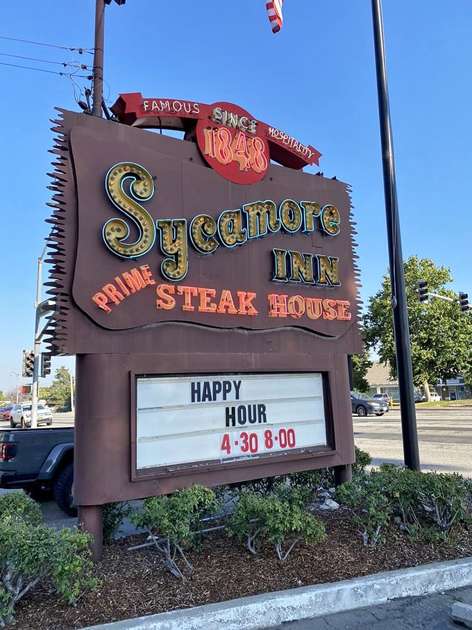 The vintage sign glows like a beacon for hungry travelers, announcing "Prime Steak House" with the confidence of decades of excellence. 