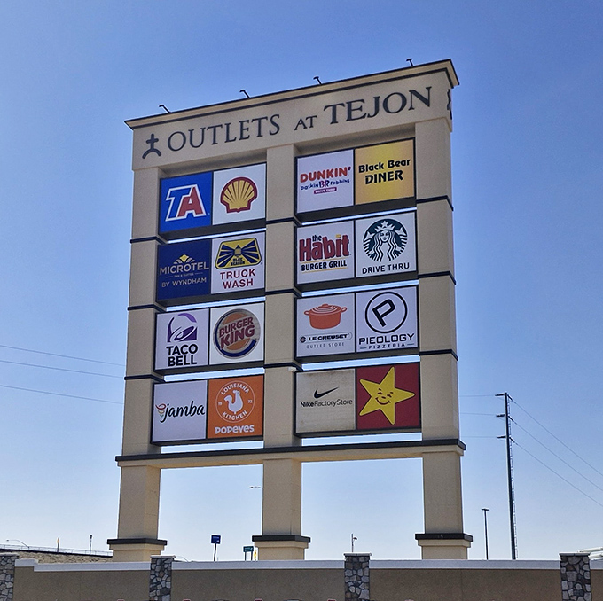 The towering testament to consumer paradise, advertising everything from Starbucks to Nike like a retail Hall of Fame.