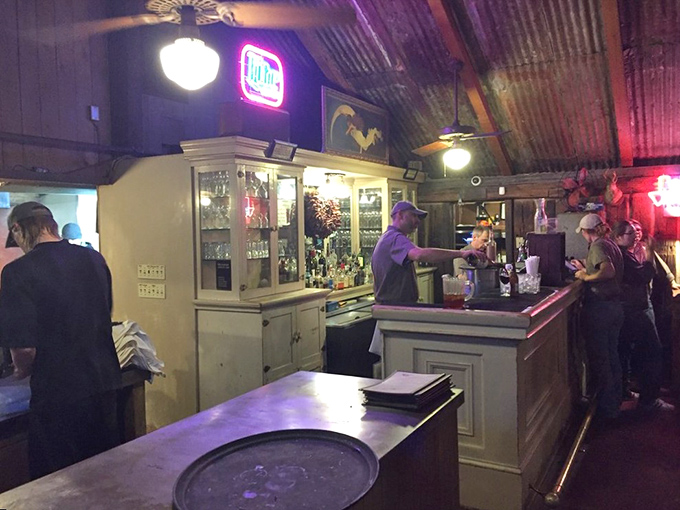 Where magic happens &ndash; the bar area glows with promise, each bottle a potential companion to your mesquite-grilled masterpiece.